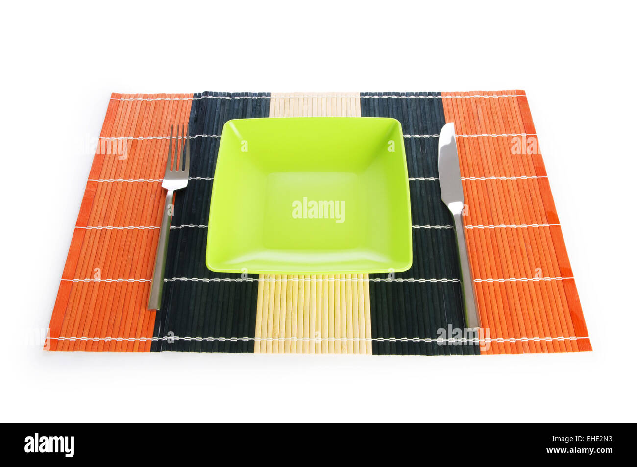 Plate with utensils isolated on the white Stock Photo - Alamy