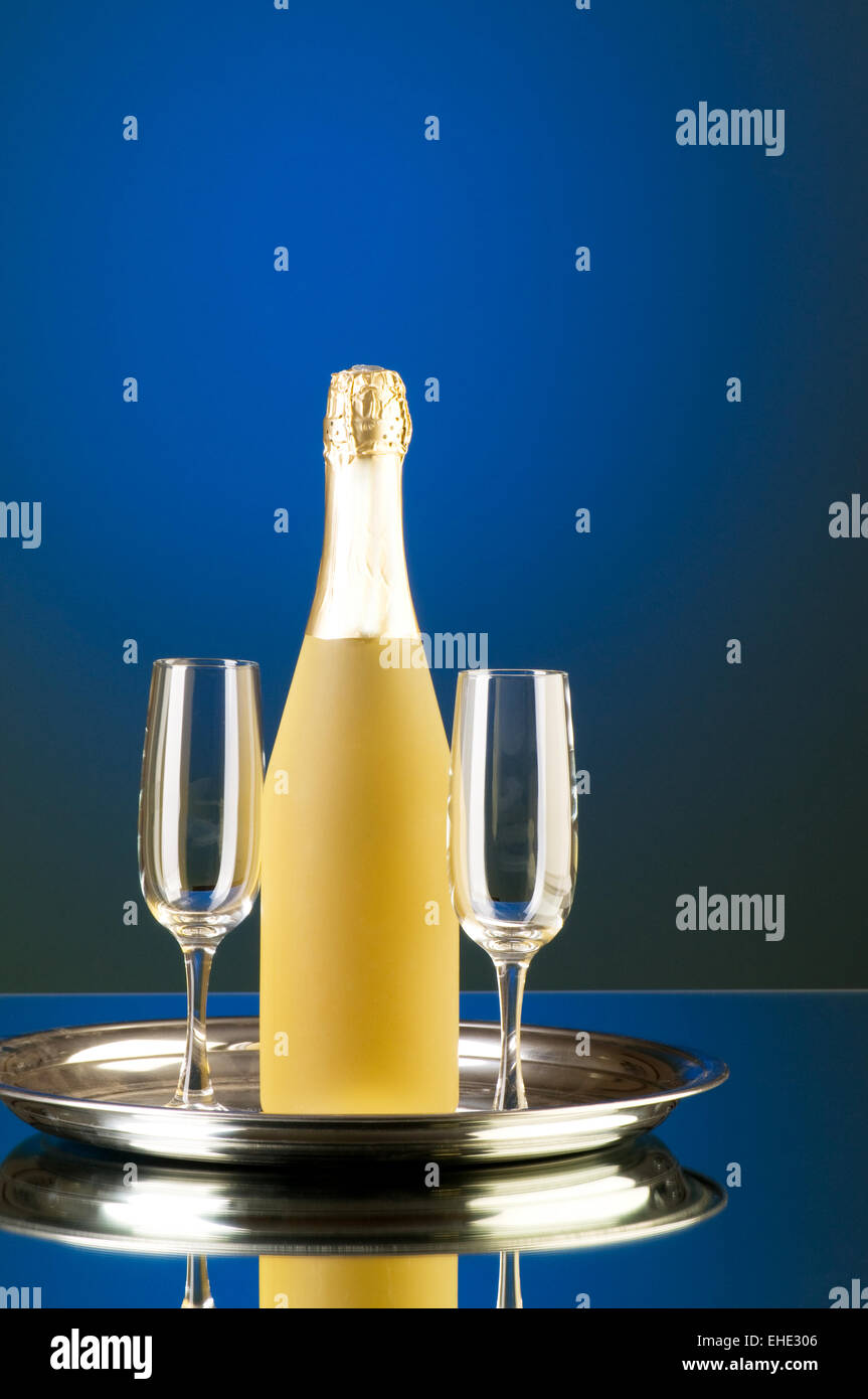 Champagne against color gradient background Stock Photo - Alamy