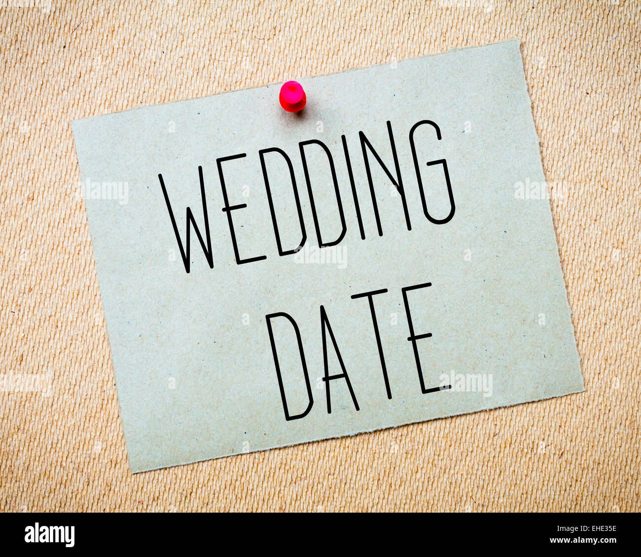 Recycled paper note pinned on cork board. Wedding Date Message. Concept ...