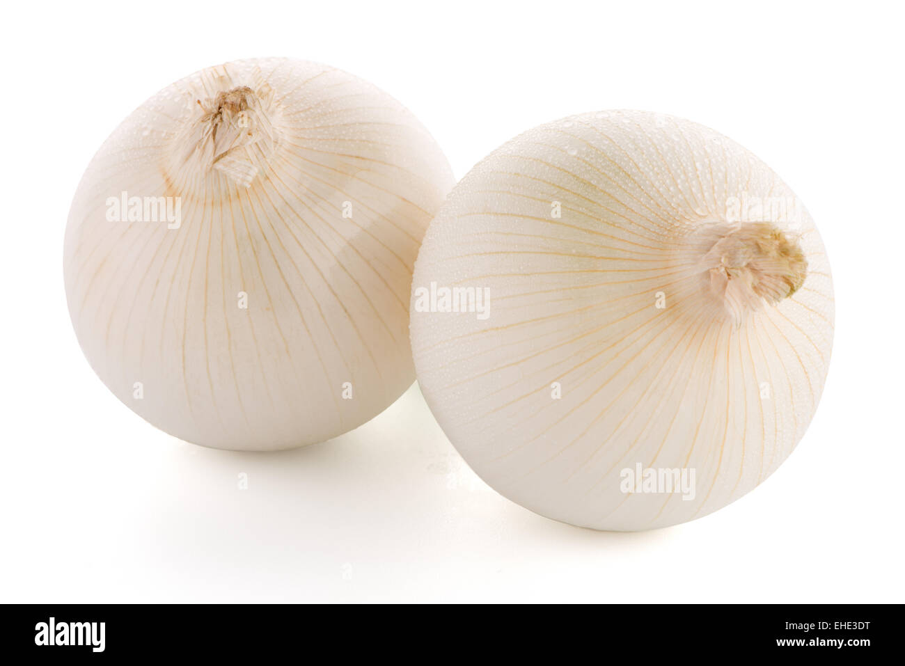 Two onions isolated on white background Stock Photo - Alamy