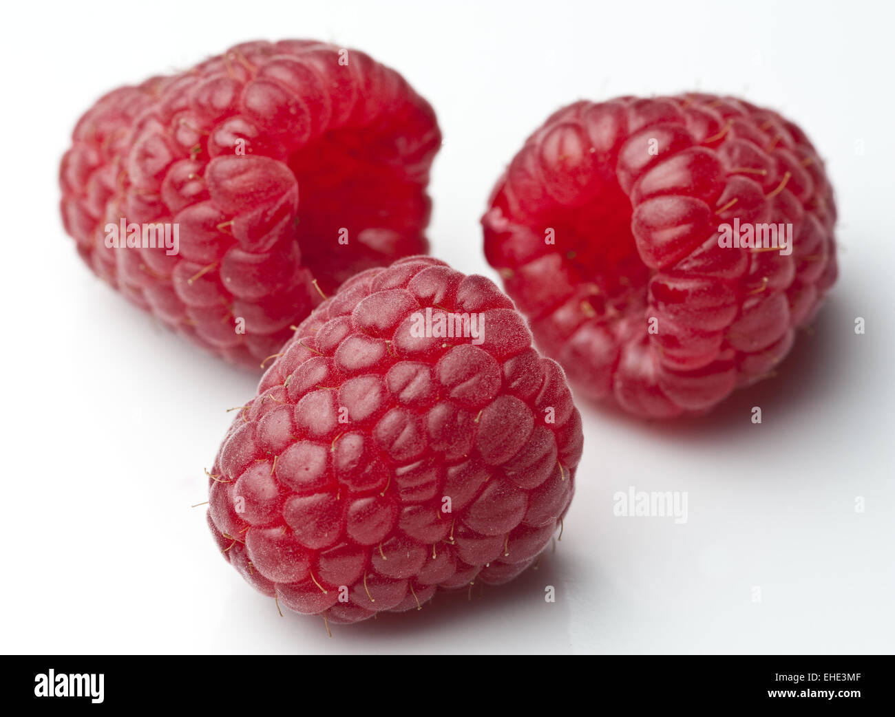Isolated raspberries hi-res stock photography and images - Alamy