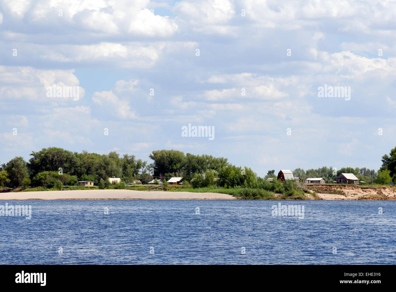 Wood on river coast Stock Photo - Alamy