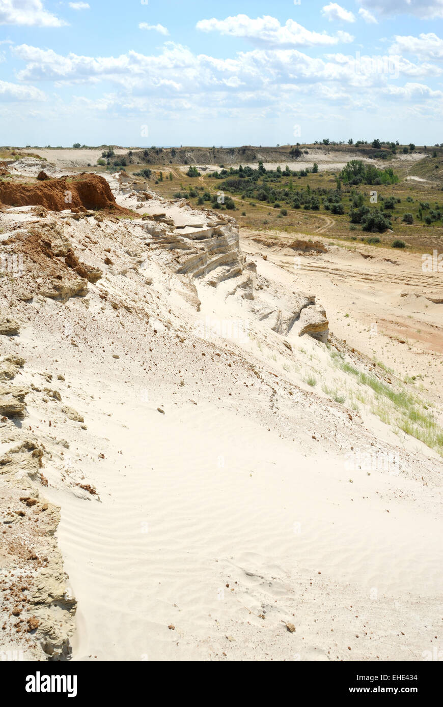 Industrial working out of white forming sand in an open-cast mine Stock ...