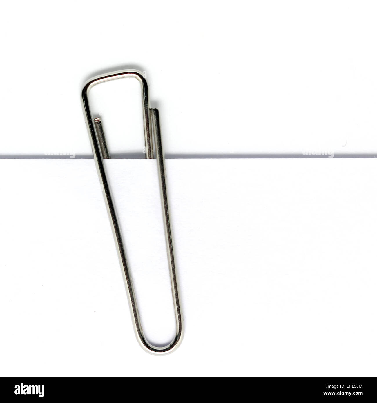 Paper clip isolated on white background Stock Photo - Alamy