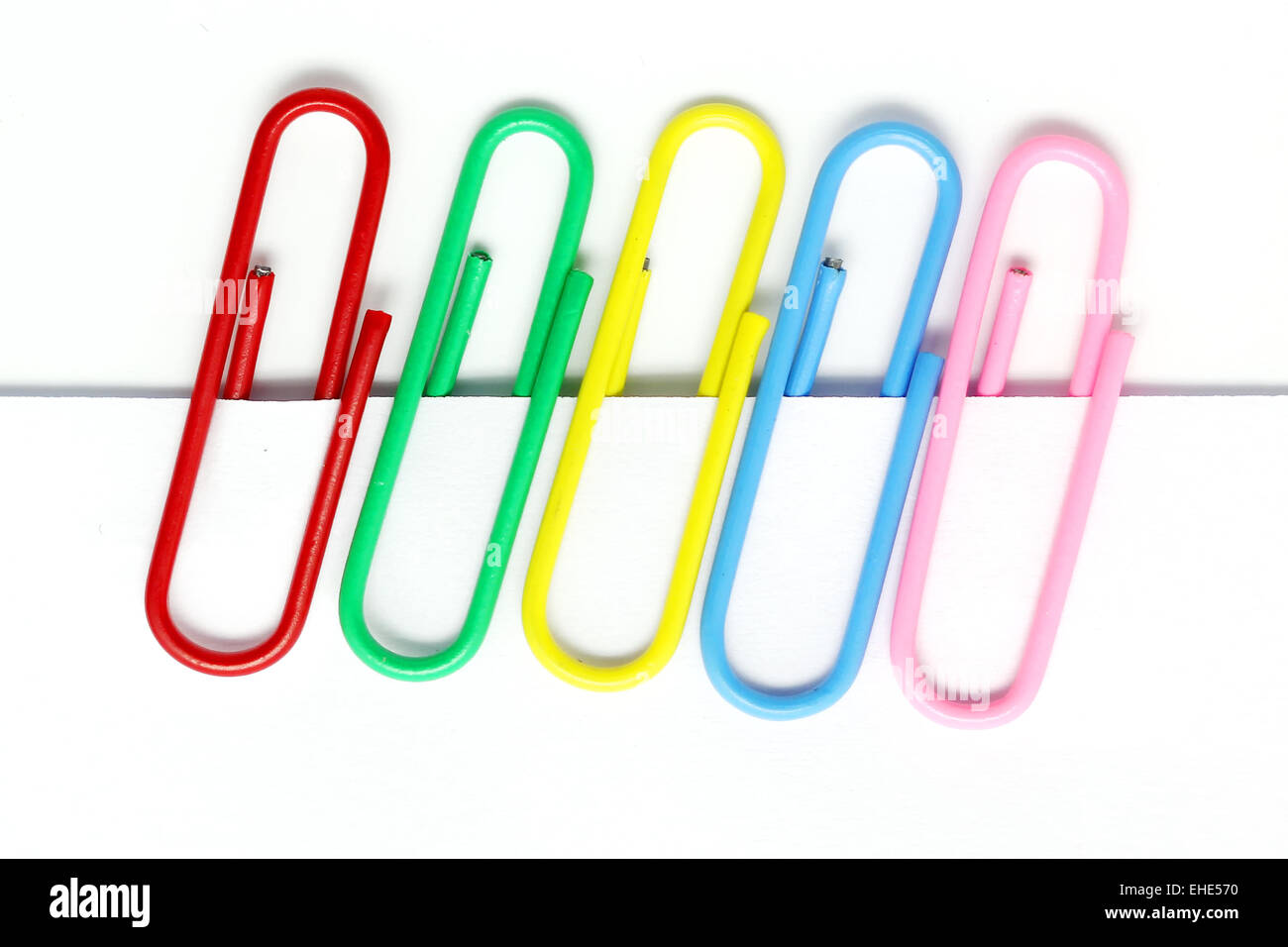 Paper clip isolated on white background Stock Photo - Alamy