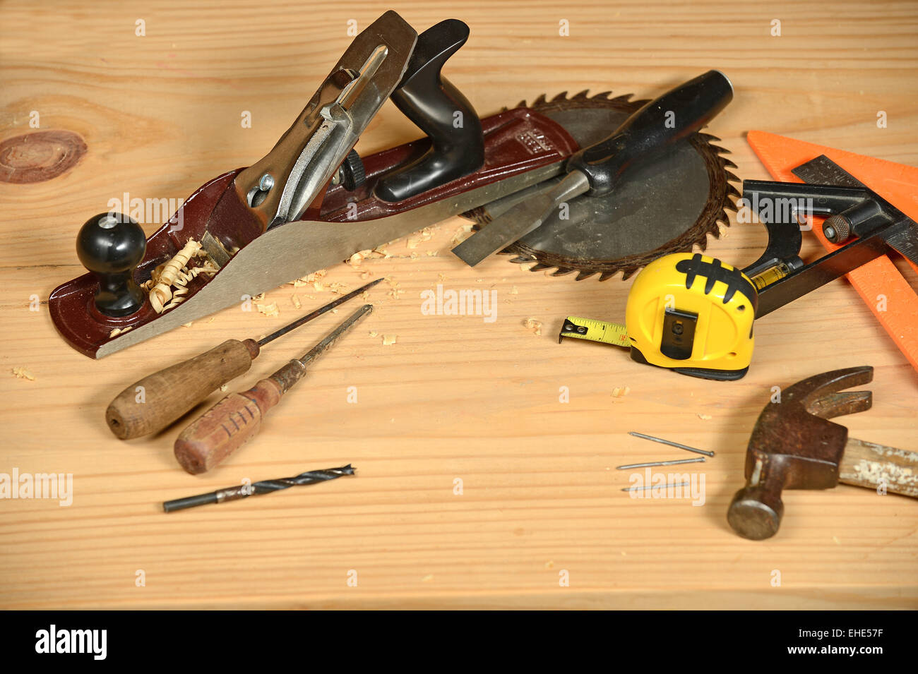 Carpenter's tools on natural wood table Stock Photo - Alamy