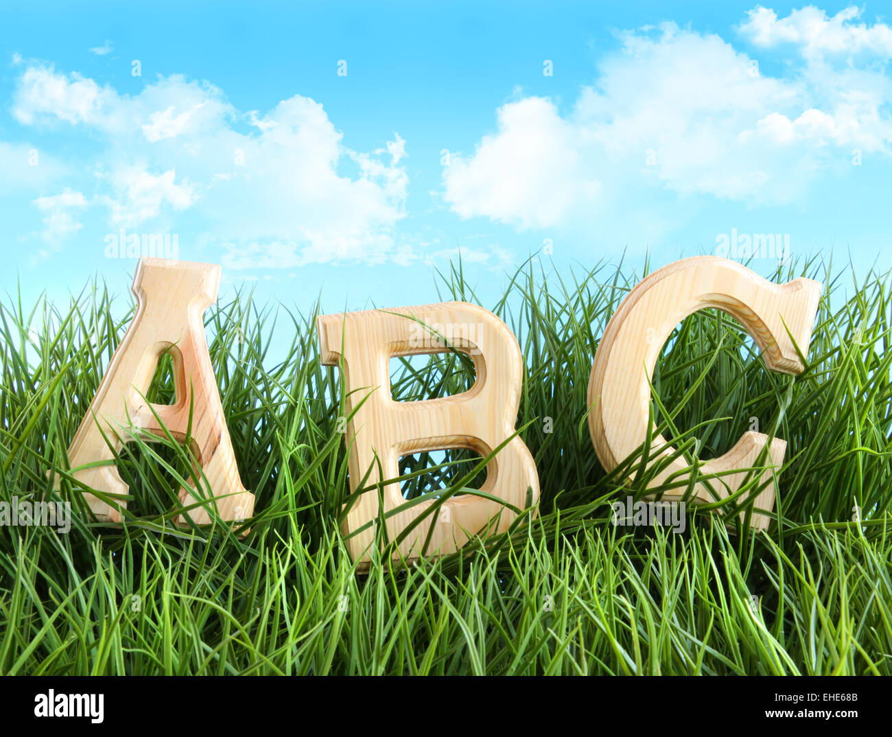 ABC letters in the grass Stock Photo - Alamy