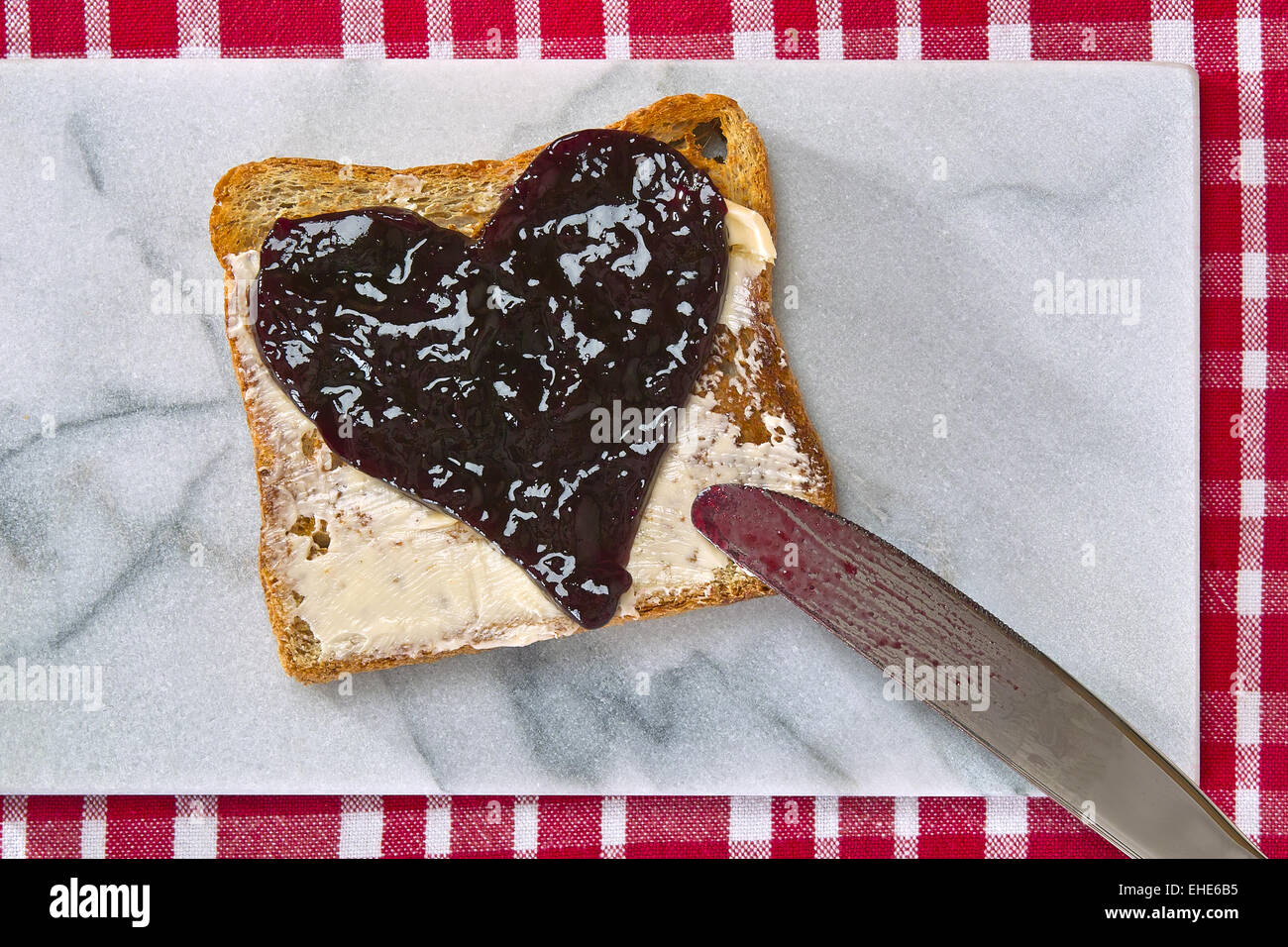 Toast with jam Stock Photo - Alamy