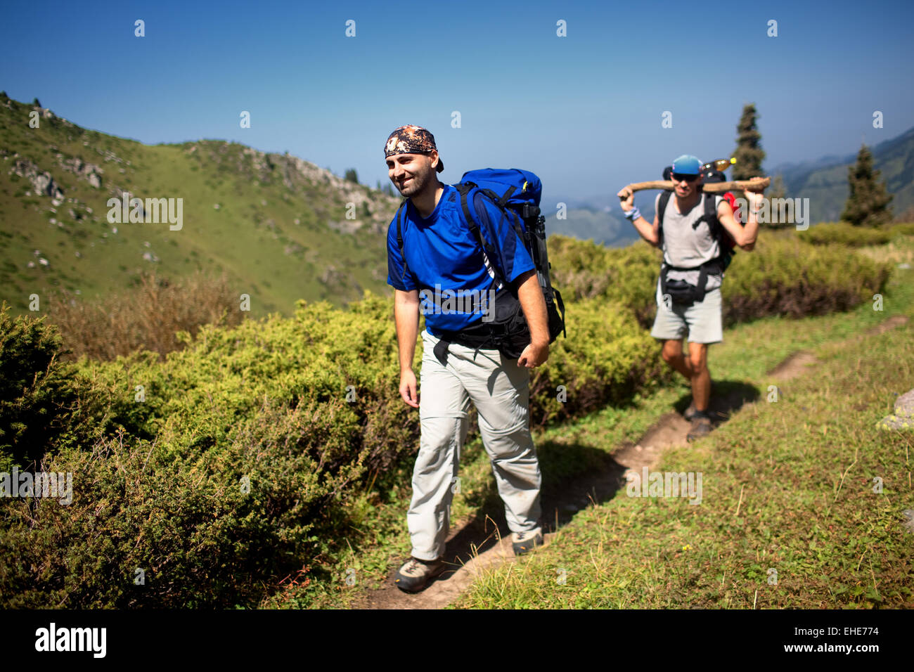 Two backpackers in summer mountain hi-res stock photography and images ...