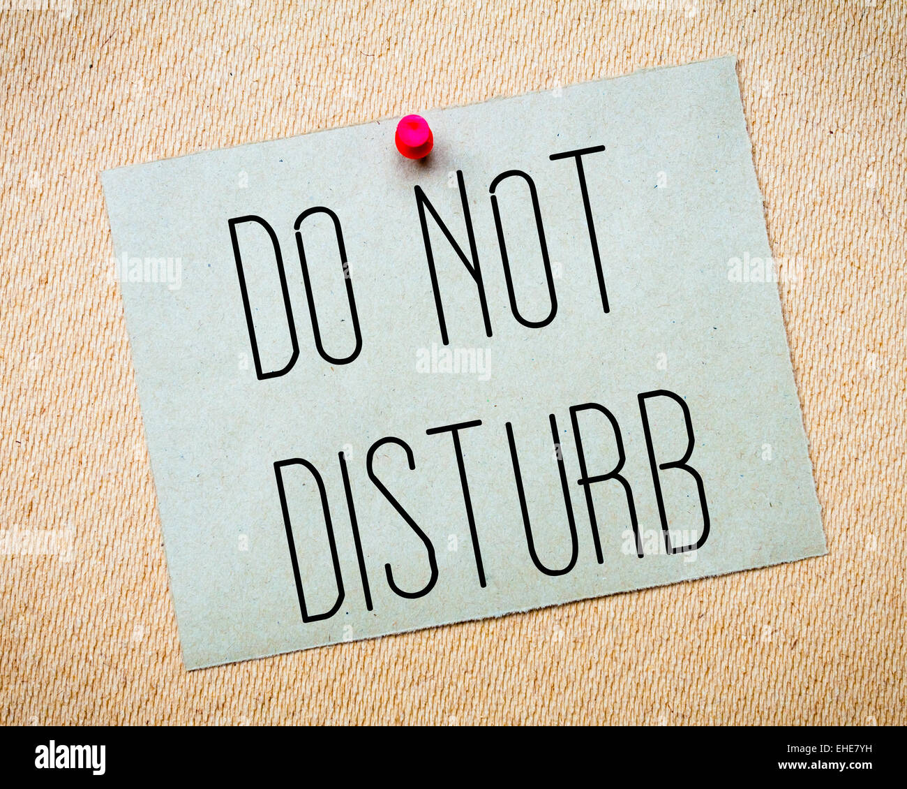 Recycled paper note pinned on cork board. Do Not Disturb Message ...