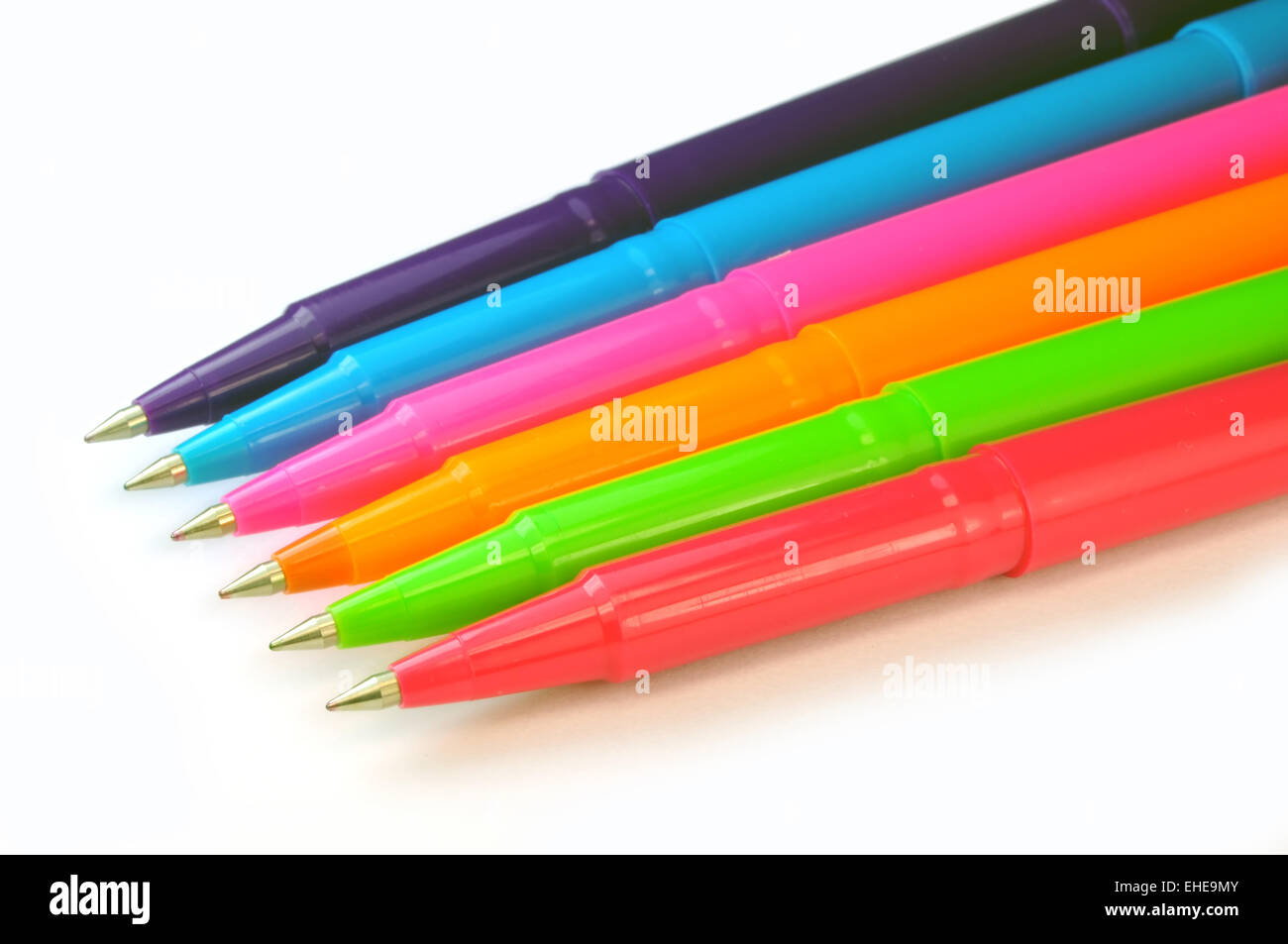 Multicolor pens on white background Stock Photo - Alamy