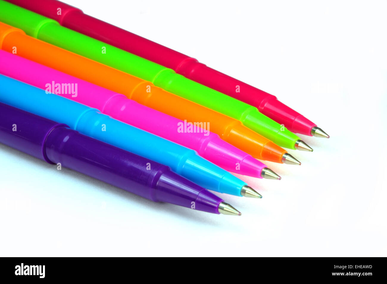 Multicolor pens on white background Stock Photo - Alamy