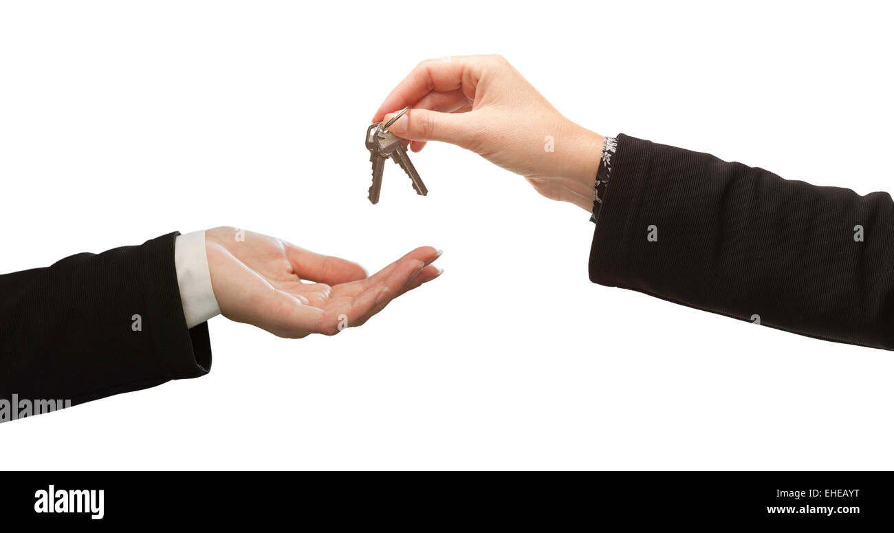 Woman Handing Over Woman Set Of New Keys Isolated on White Stock Photo ...