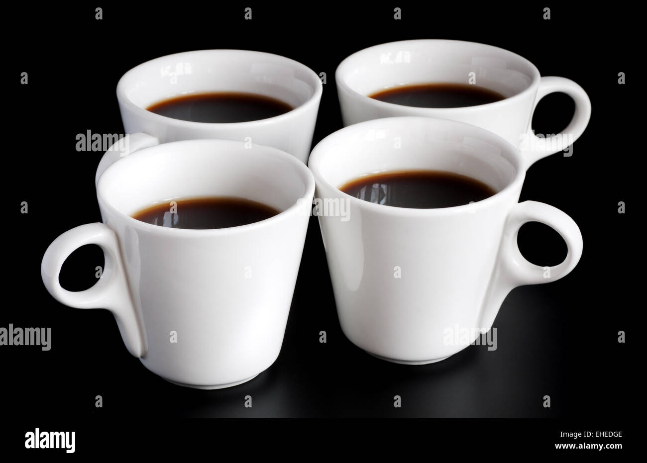 four coffee cups Stock Photo - Alamy