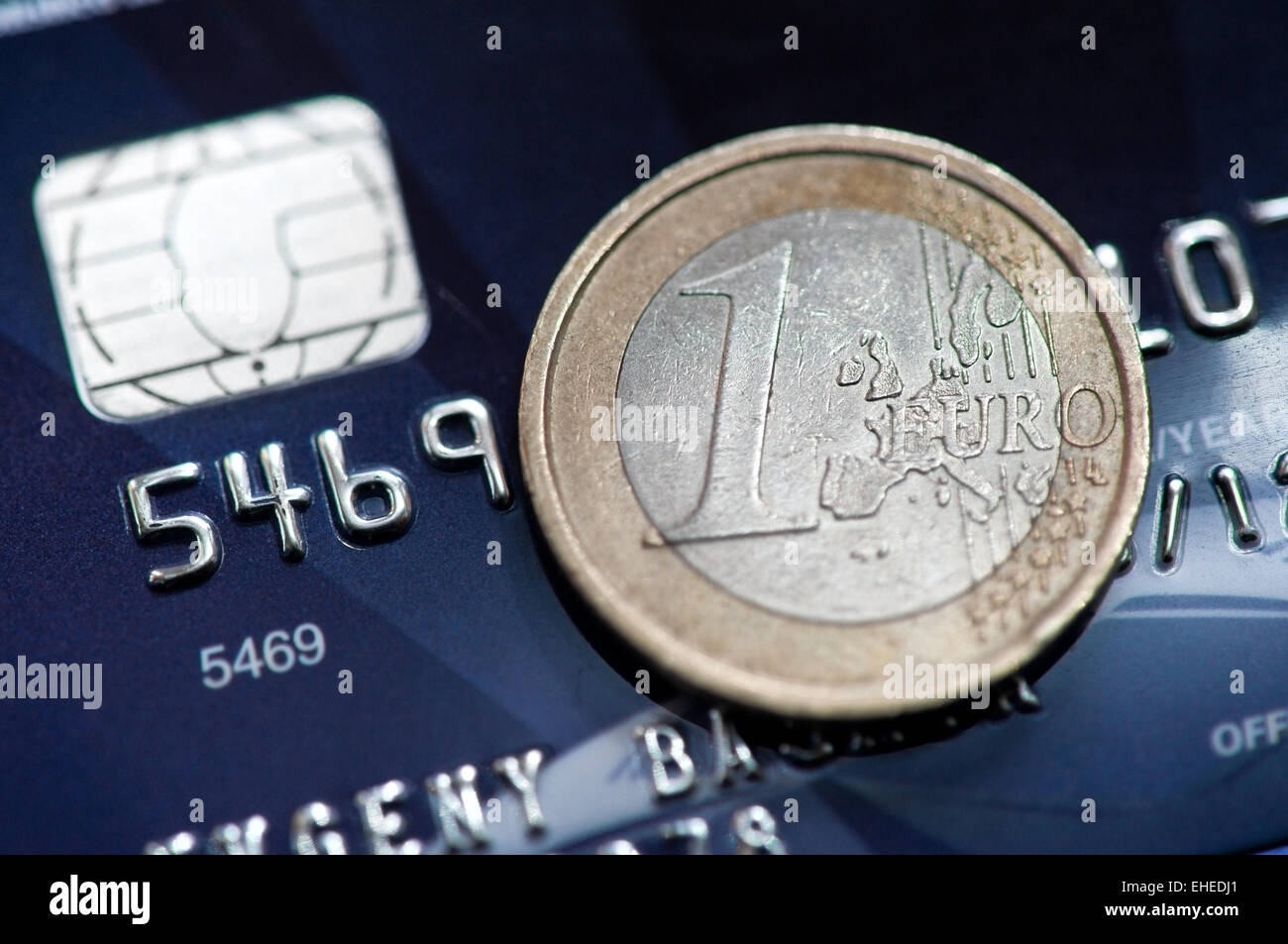 1 euro and credit card Stock Photo - Alamy