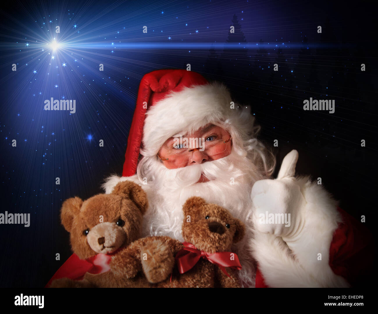 Santa smiling holding toy teddy bears Stock Photo - Alamy