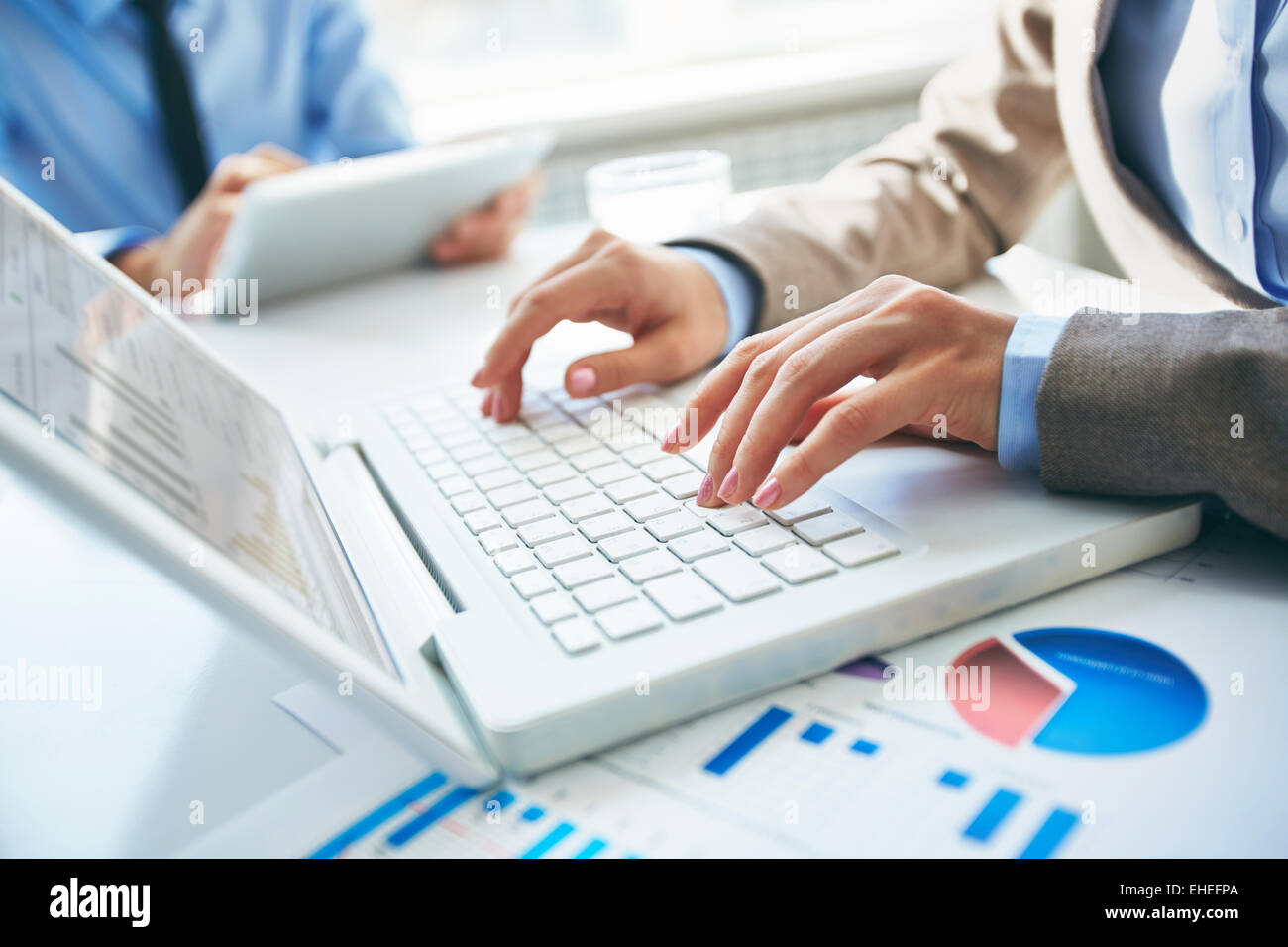 Female hands typing on laptop Stock Photo - Alamy