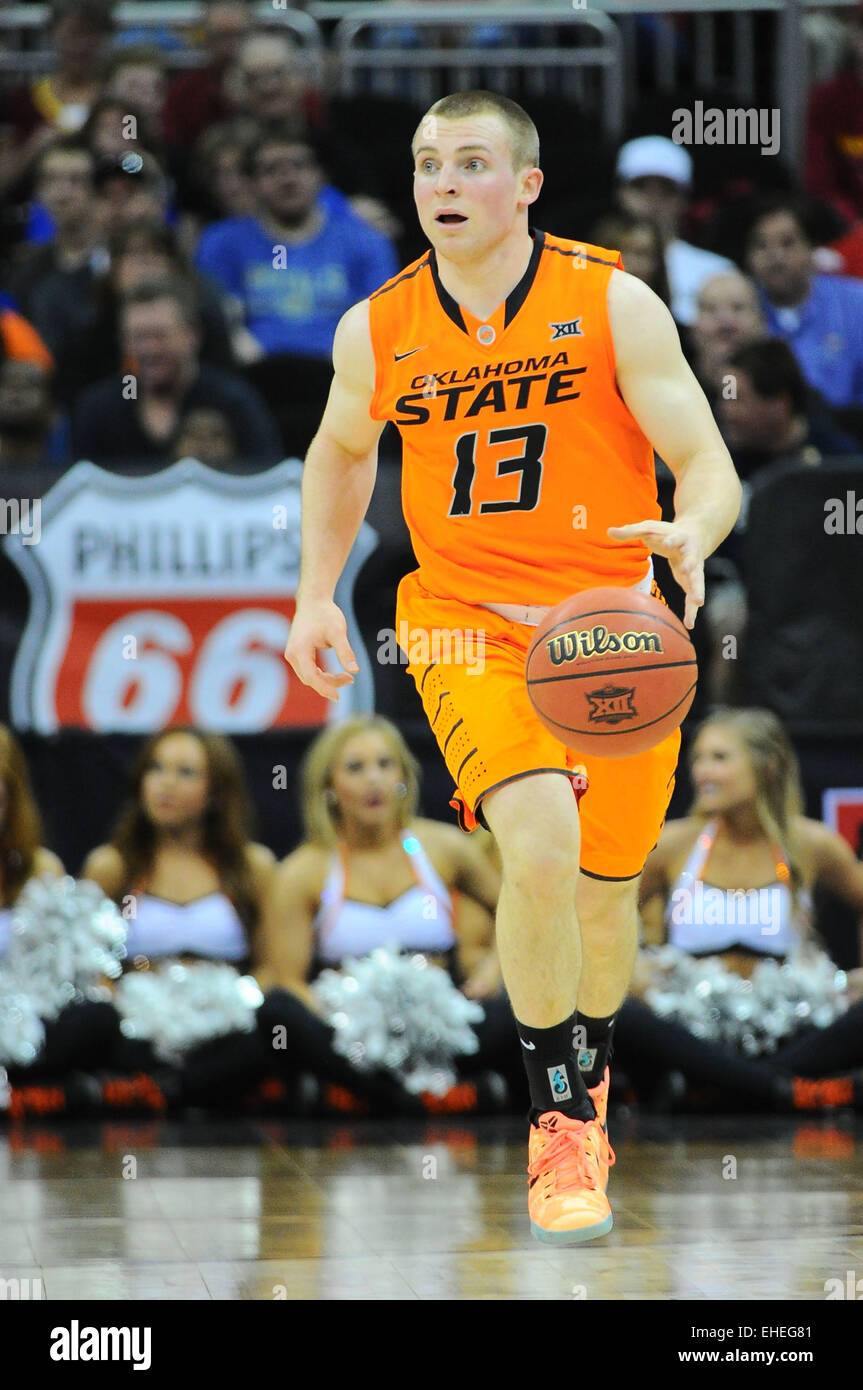 March 12, 2015: Oklahoma State Cowboys guard Phil Forte III (13) brings ...