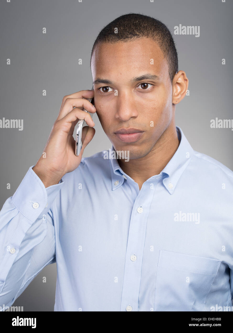 Businessman using Apple iphone Stock Photo - Alamy