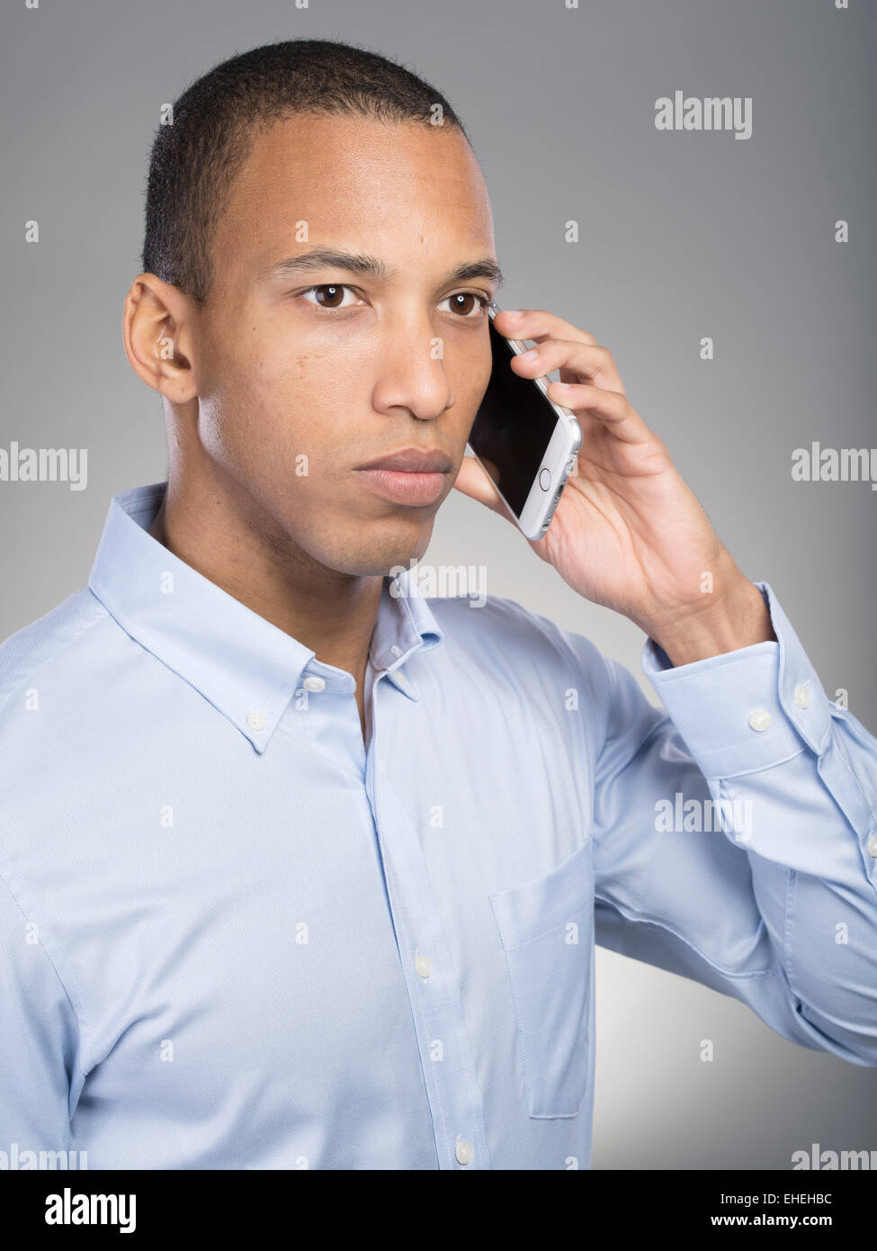 Businessman using Apple iphone Stock Photo - Alamy