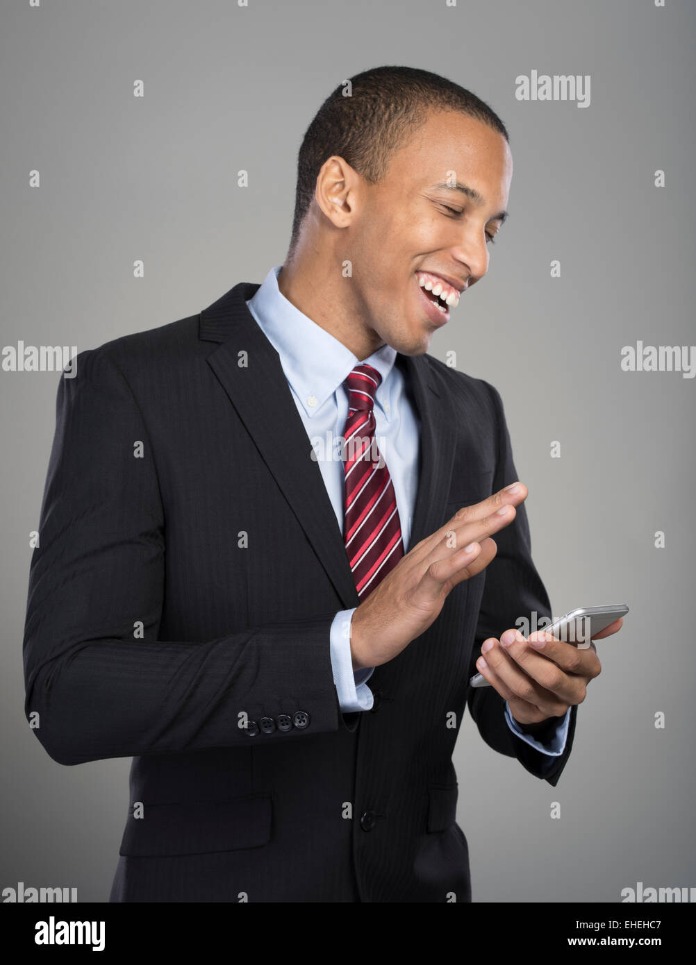 Businessman using Apple iphone Stock Photo - Alamy