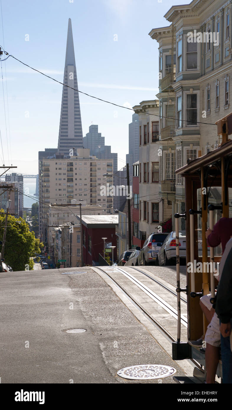 A San Francisco Trolly moves people along with Trans America Tower in ...