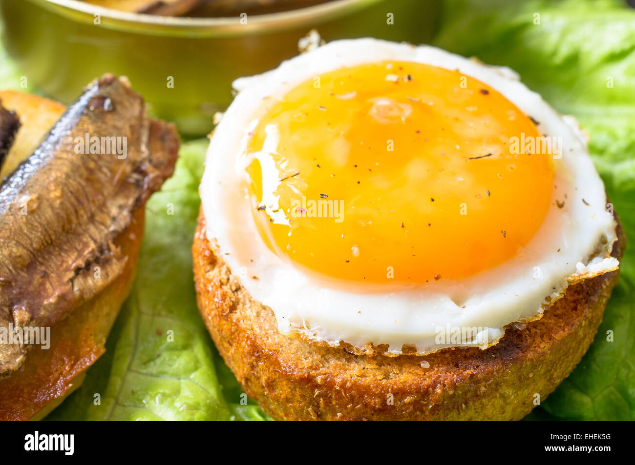 Tapas, appetizer burger bun with fried egg Stock Photo - Alamy