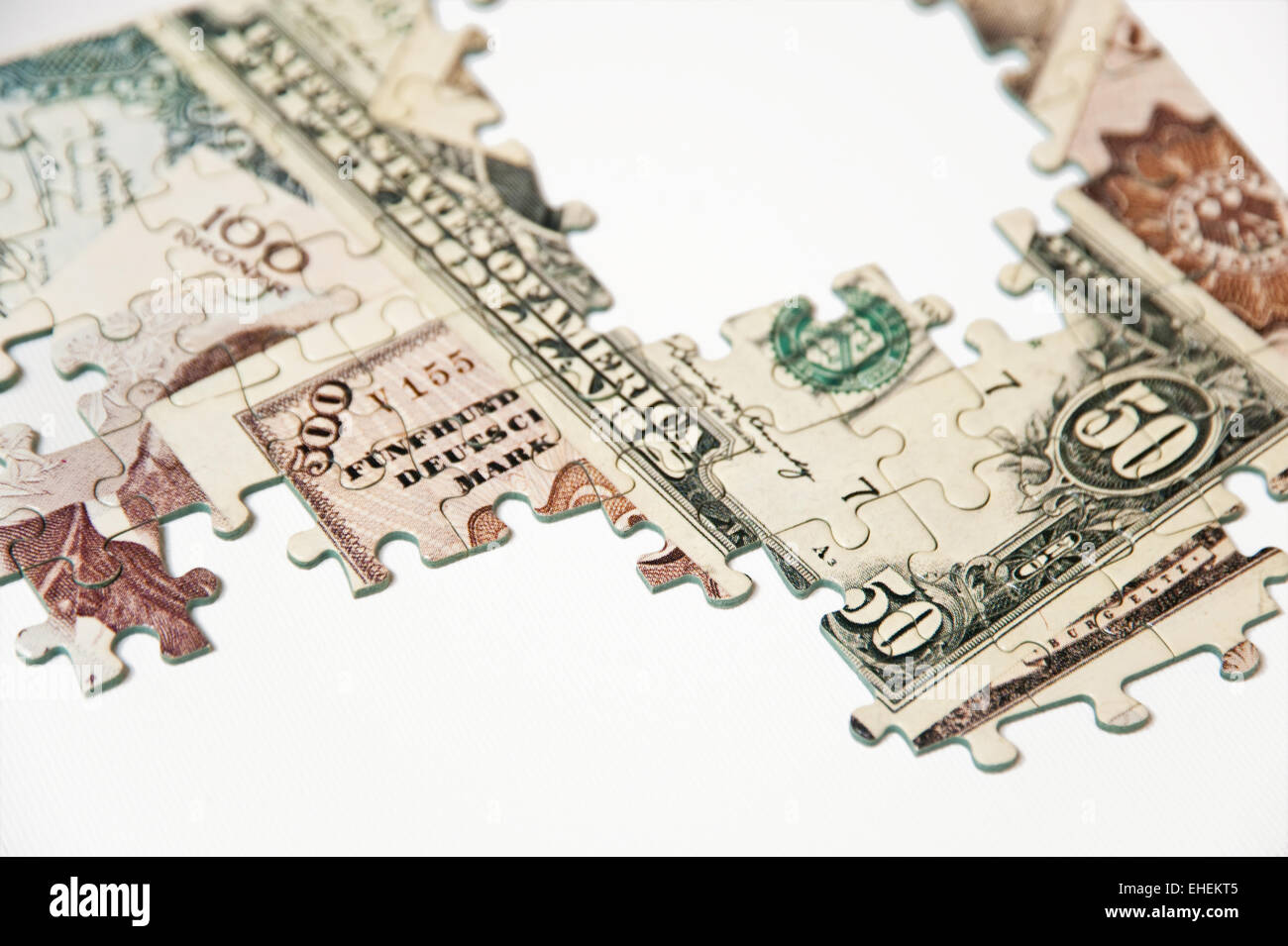 Geldpuzzle - Puzzle of money Stock Photo - Alamy