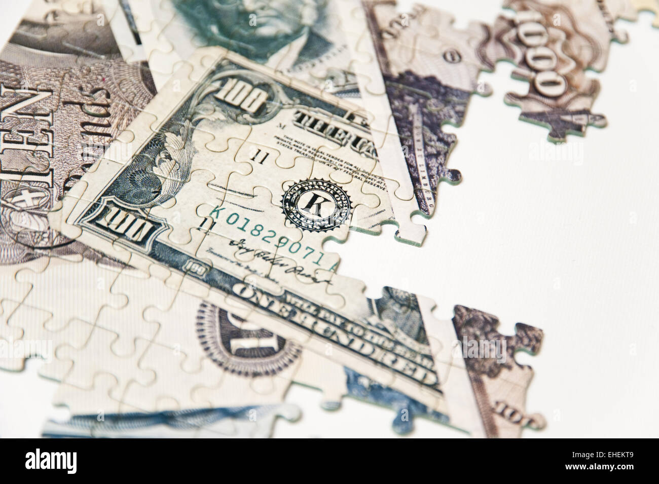 Geldpuzzle - Puzzle of money Stock Photo - Alamy