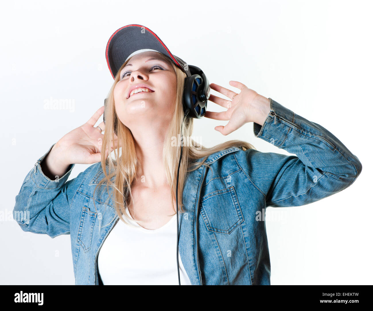 Girl listening to music and dancing Stock Photo - Alamy