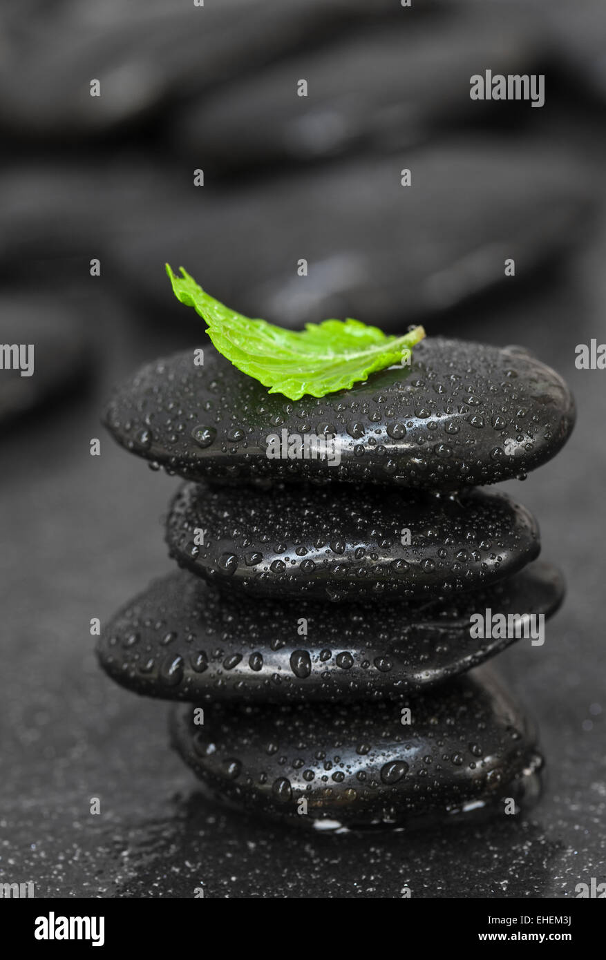 Stack of black pebbles Stock Photo - Alamy
