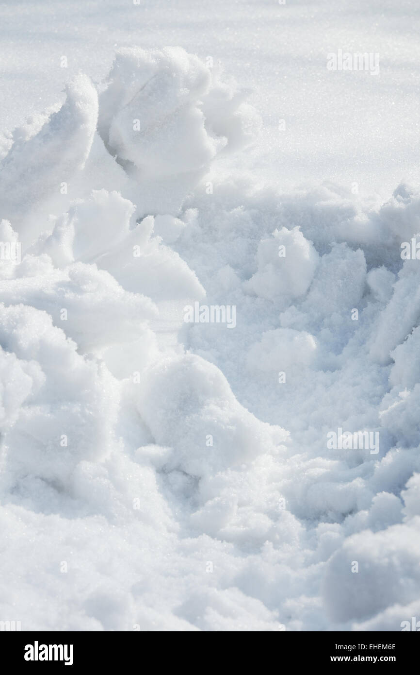 Snow drifts removal, background, closeup Stock Photo - Alamy