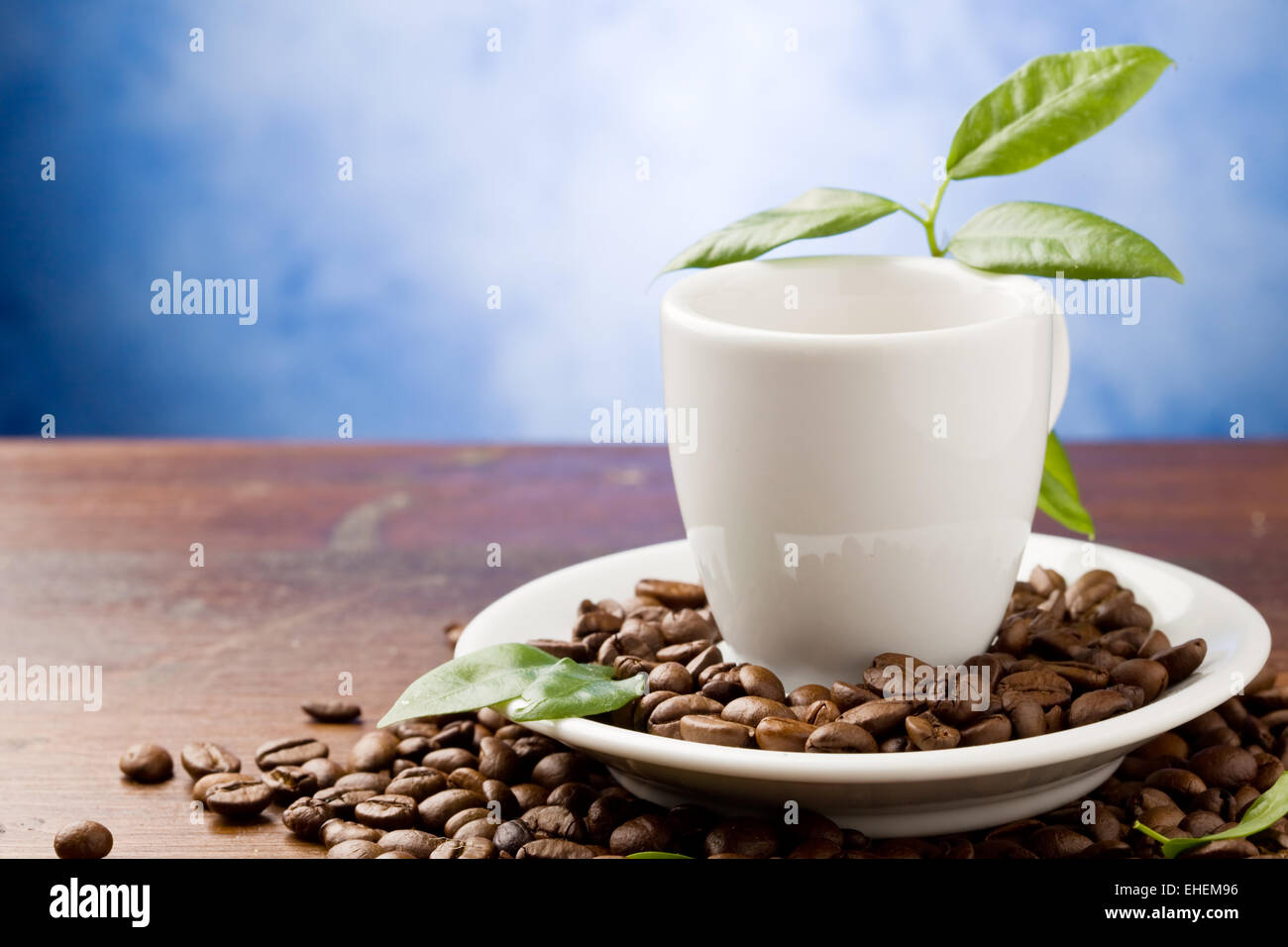 Espresso with green leaves Stock Photo - Alamy