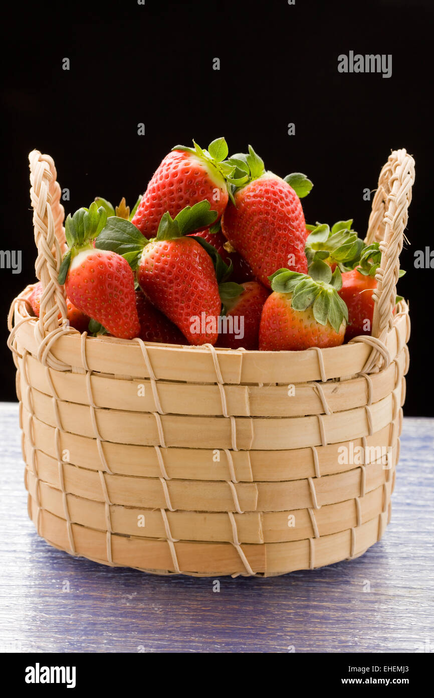 Strawberries inside a basket Stock Photo - Alamy