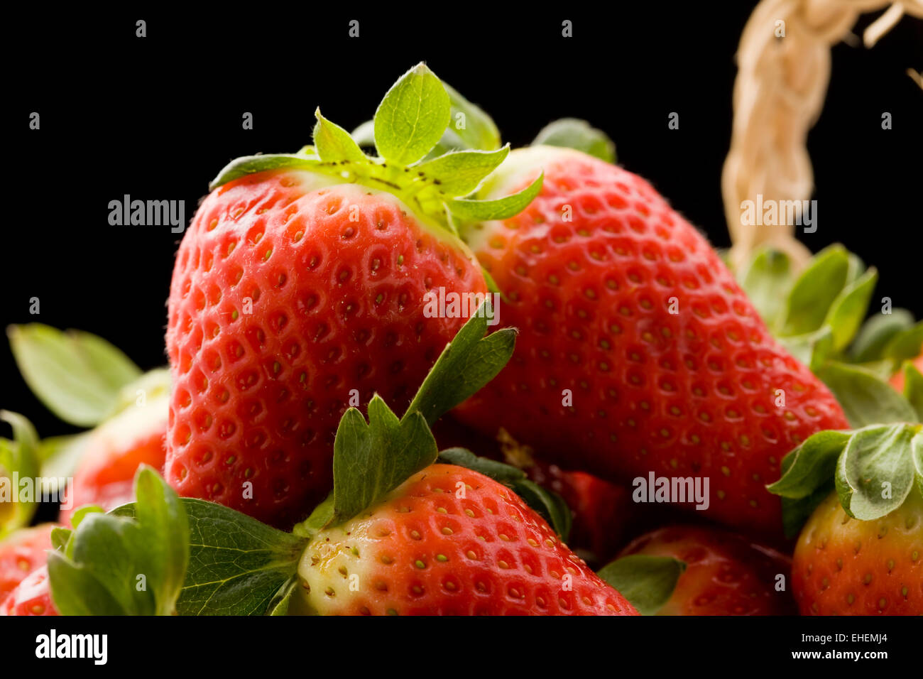 Strawberries inside a basket Stock Photo - Alamy