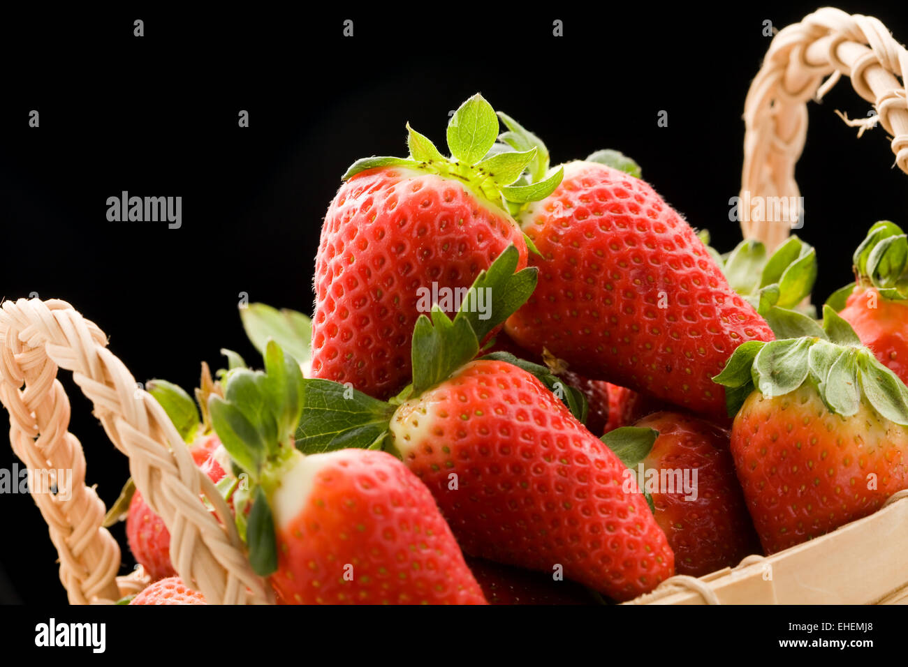 Strawberries inside a basket Stock Photo - Alamy