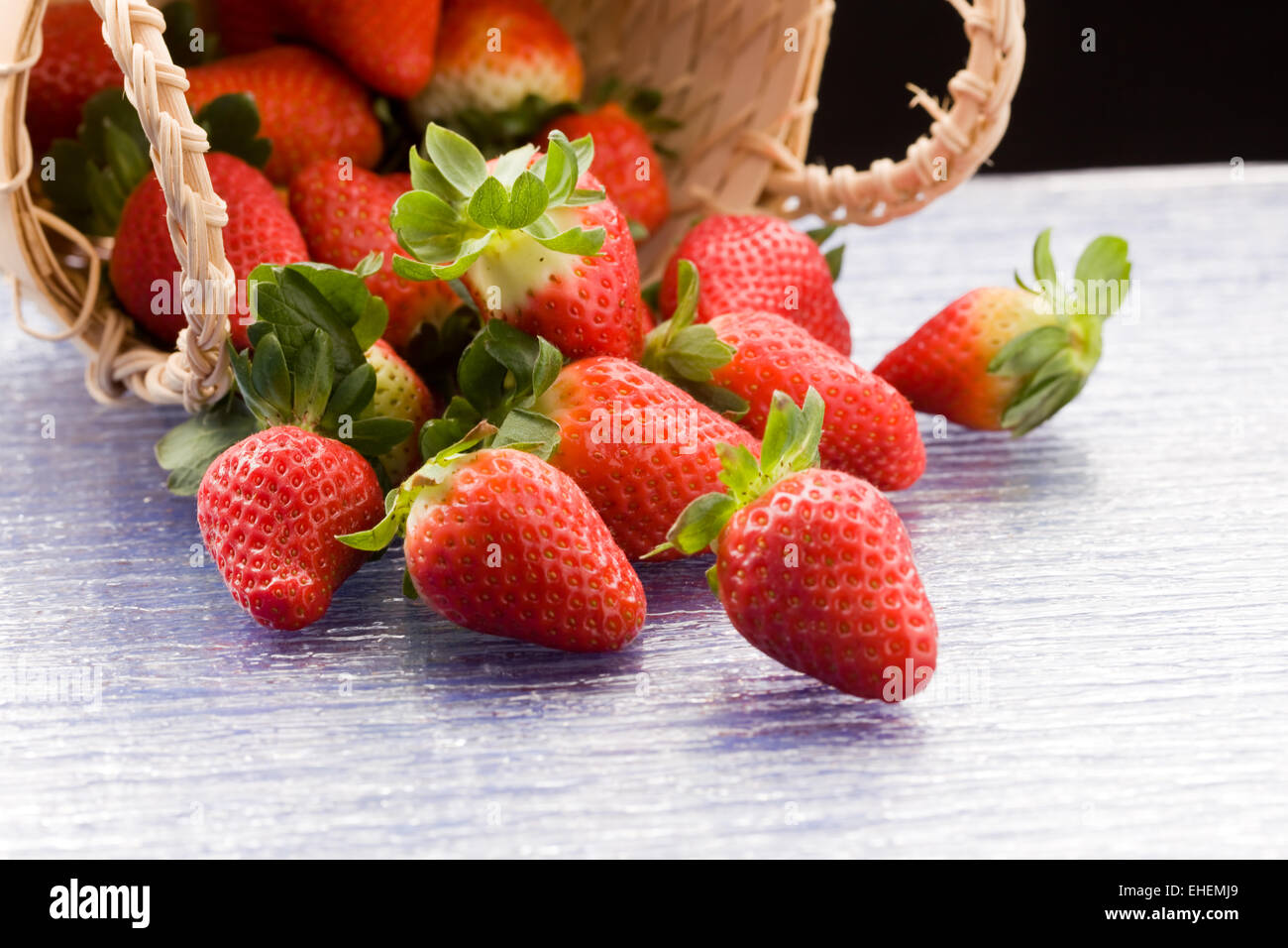 Strawberries inside a basket Stock Photo - Alamy