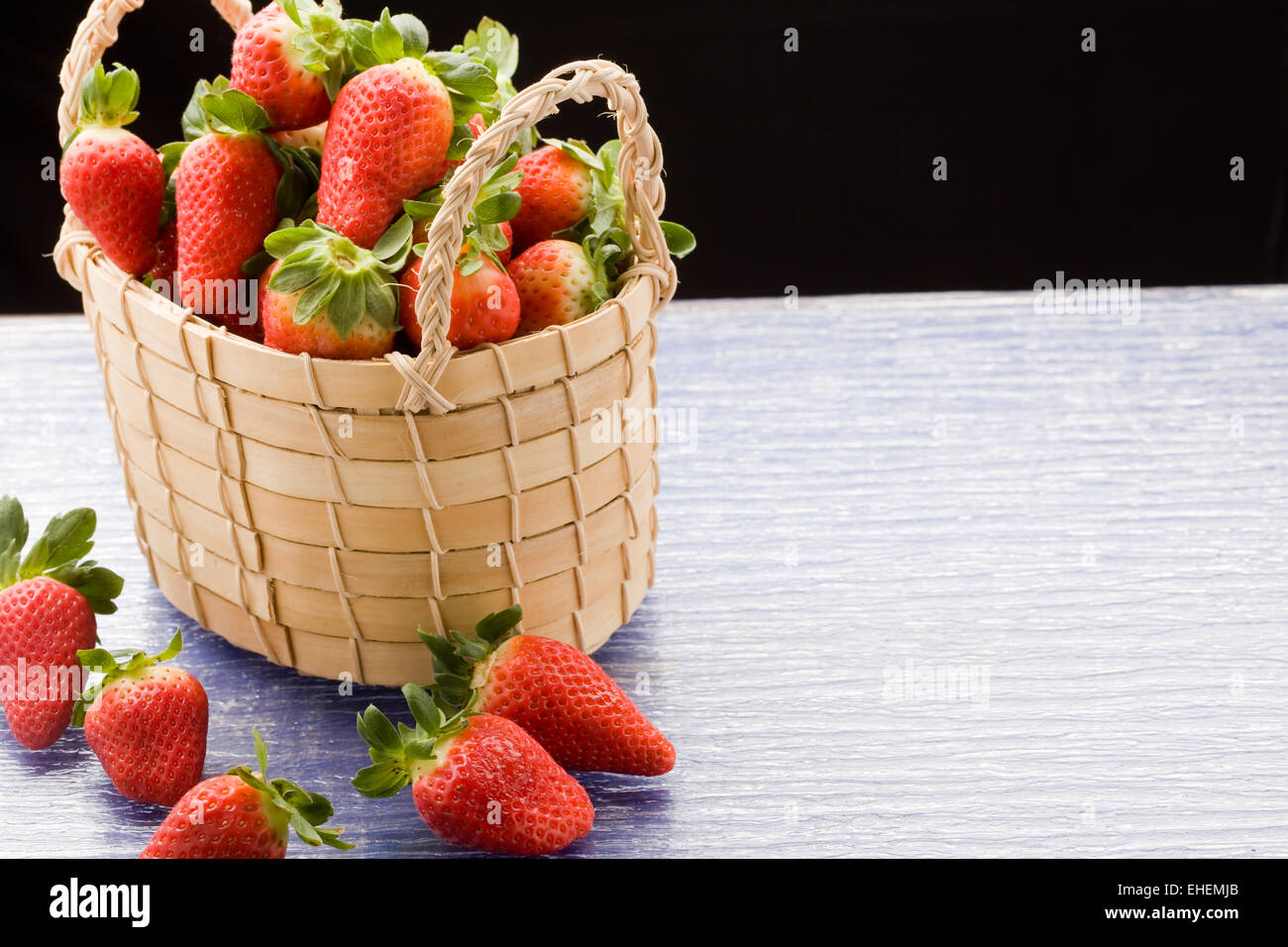 Strawberries inside a basket Stock Photo - Alamy