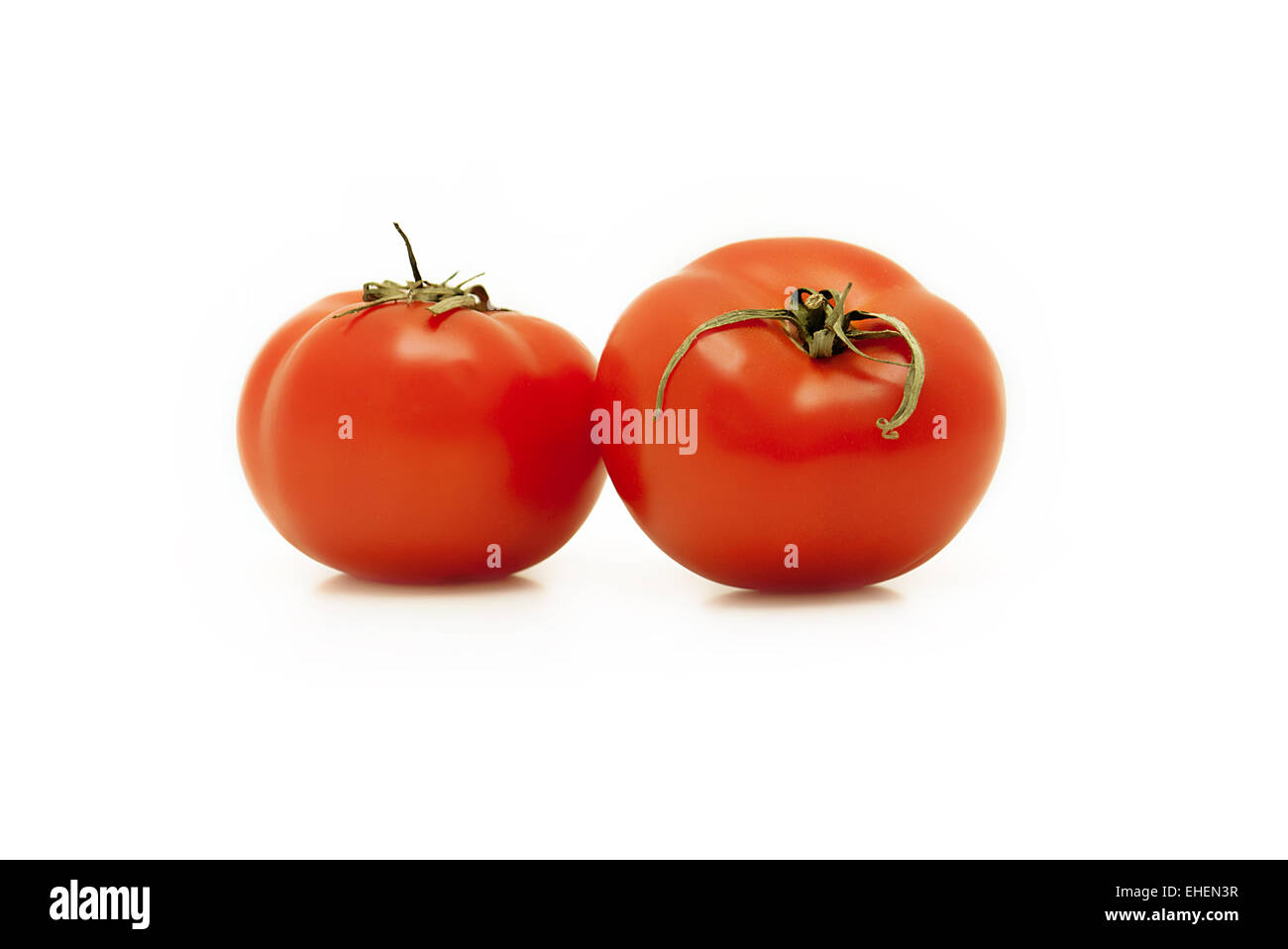 two red tomatoes Stock Photo - Alamy