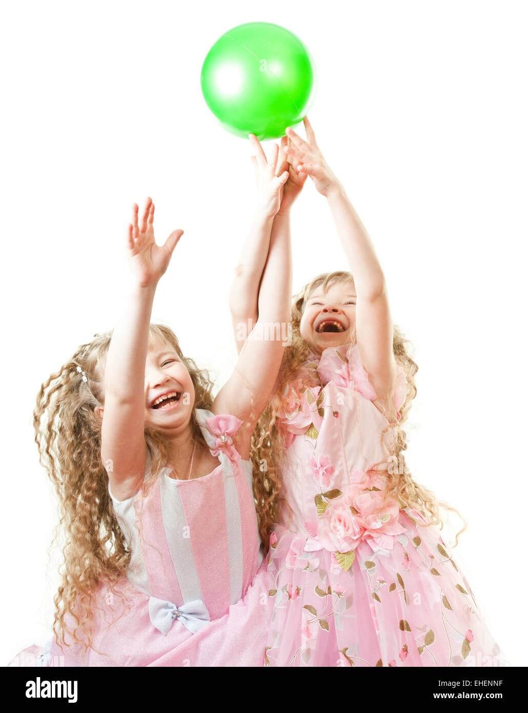 Twin sisters playing Stock Photo - Alamy