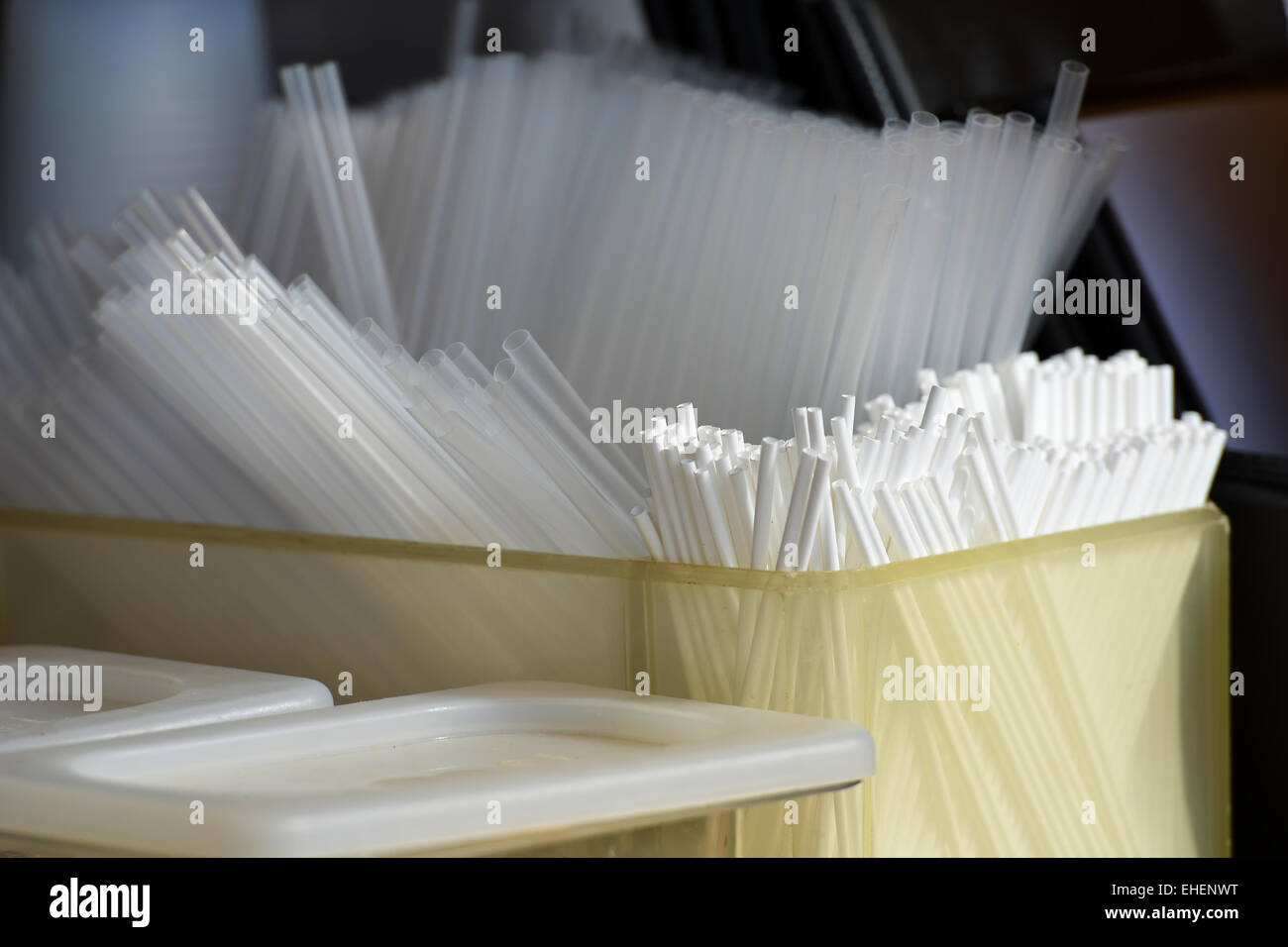 A lot of straws in a plastic container Stock Photo - Alamy