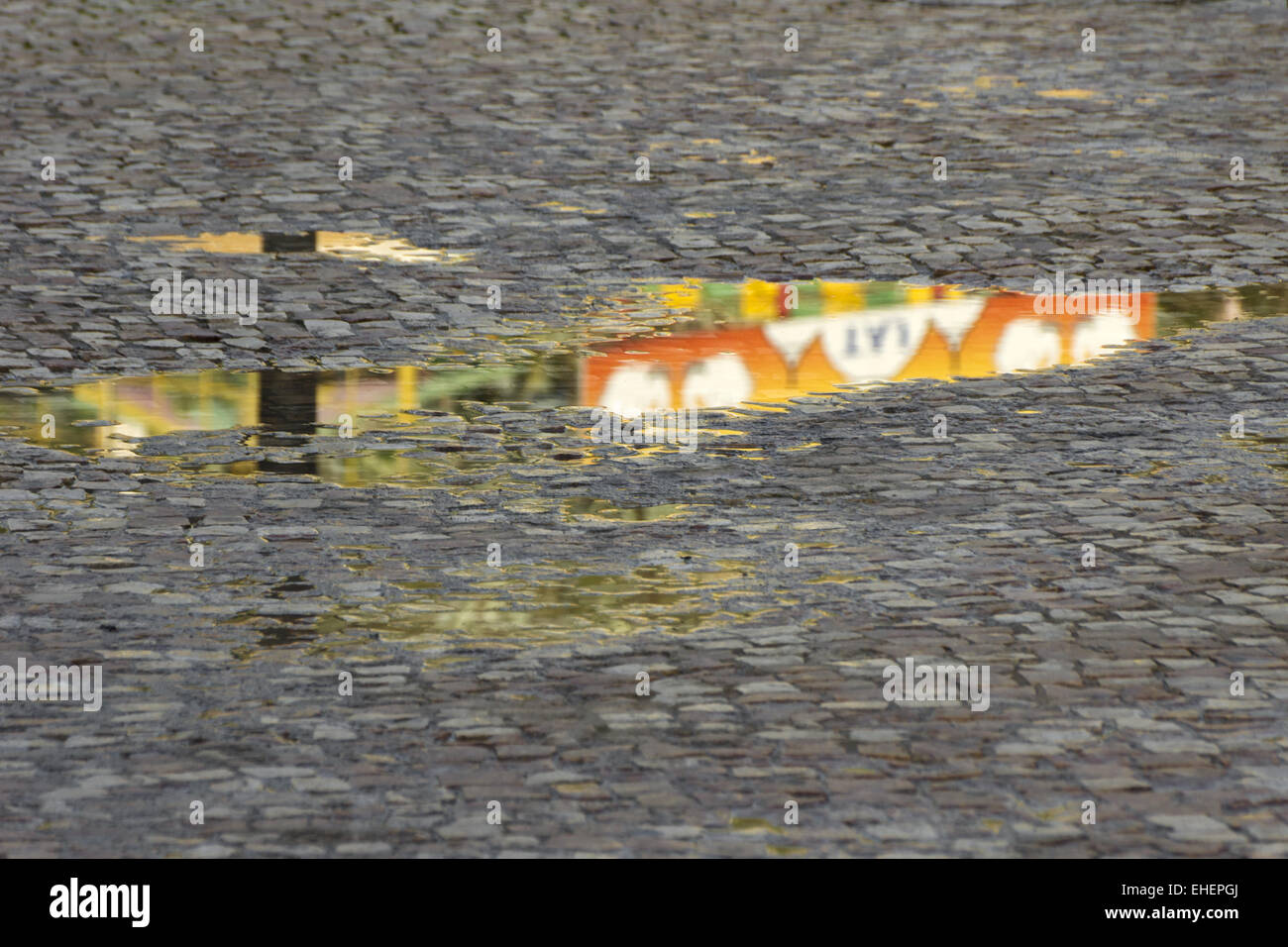 Reflection in a puddle Stock Photo - Alamy
