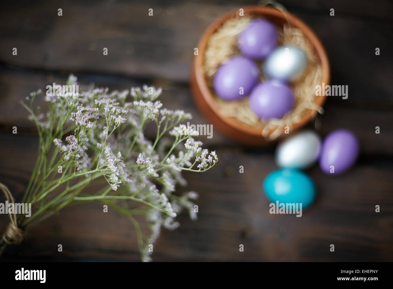 Close-up of wildflowers against Easter eggs Stock Photo - Alamy