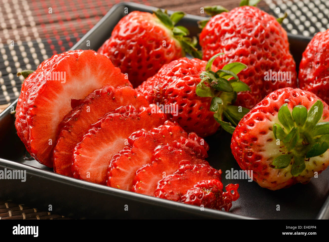 Strawberries in bowl Stock Photo - Alamy