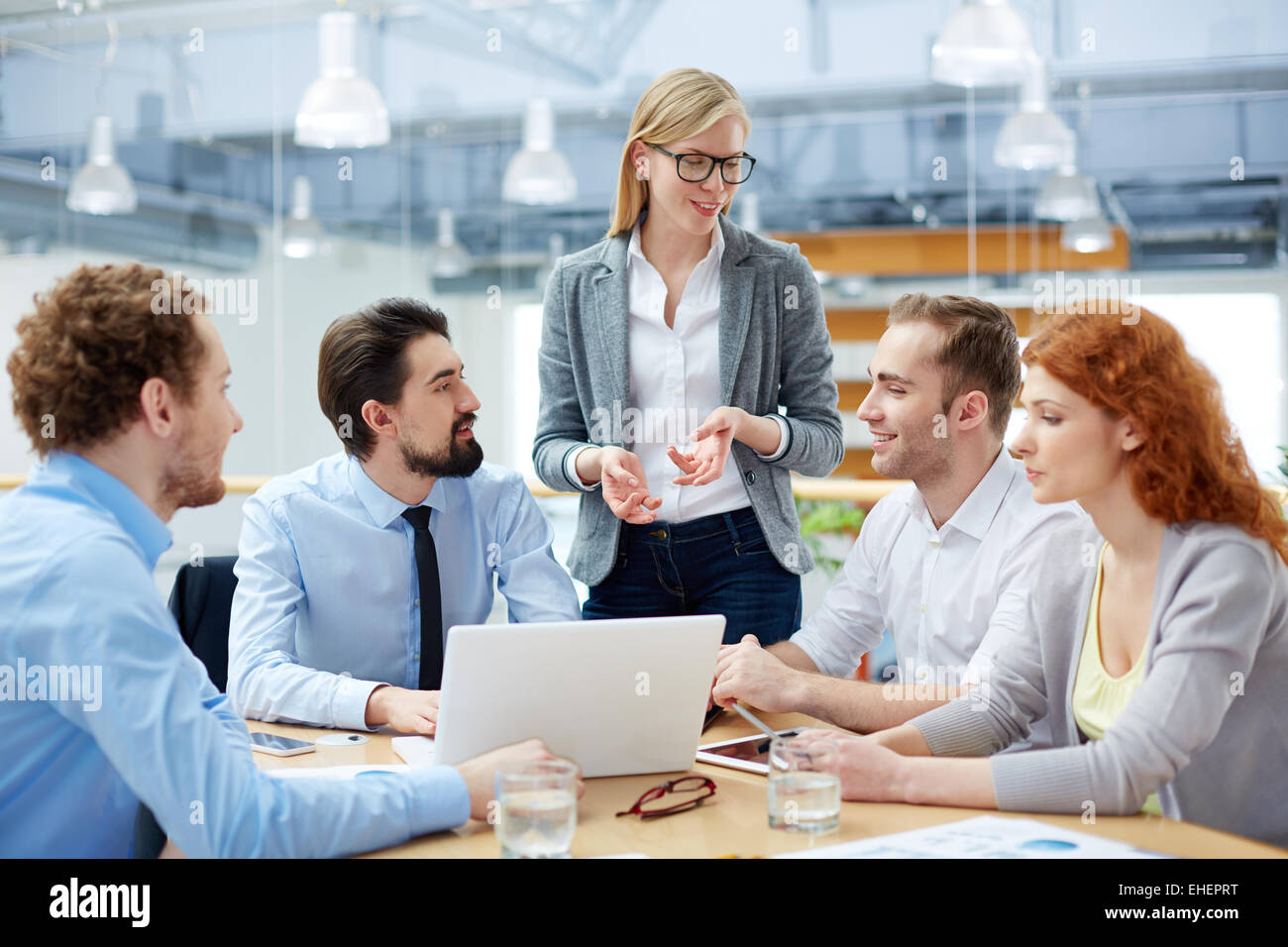Group of people sitting at discussion Stock Photo - Alamy