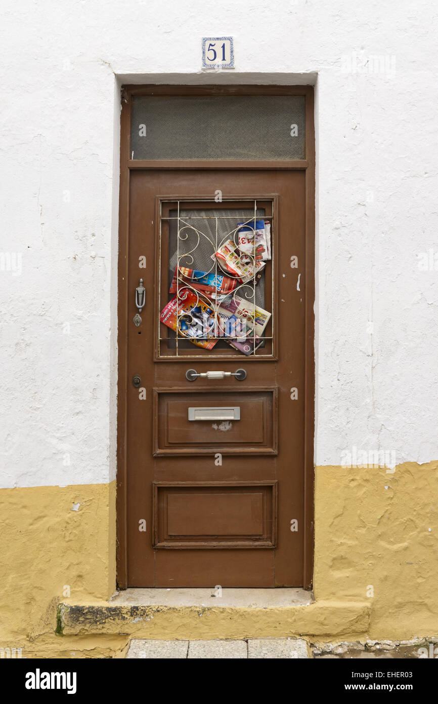 Front door with advertising Stock Photo - Alamy