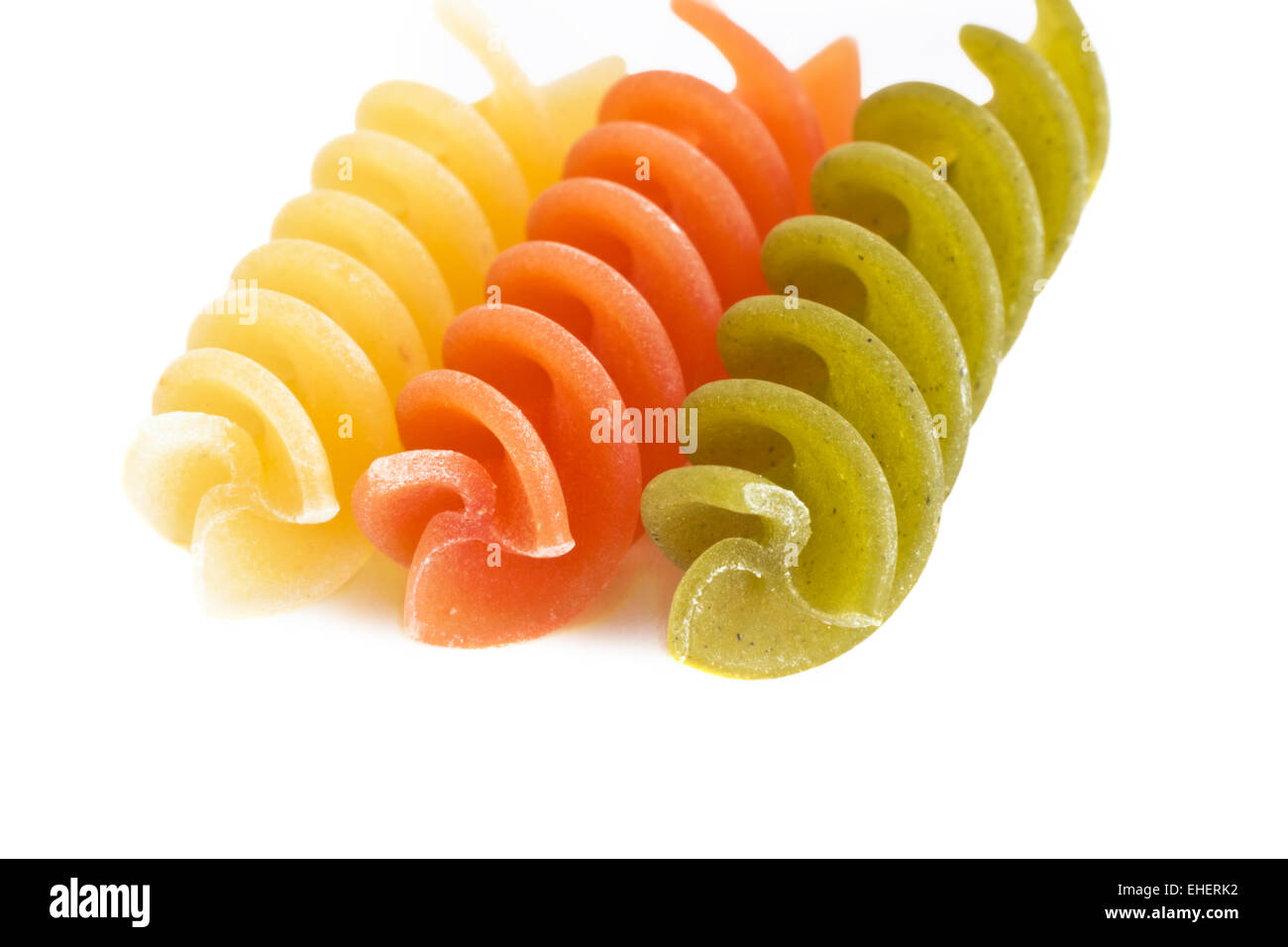 Colorful raw fusilli macaroni Stock Photo - Alamy