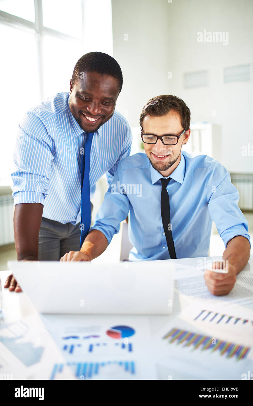 Two businessmen making project Stock Photo - Alamy
