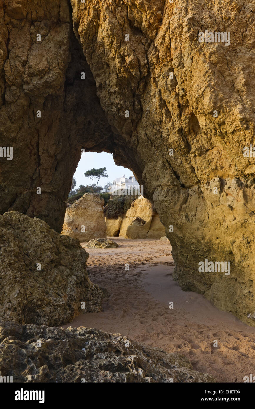 Rocks with passage in Albufeira Stock Photo - Alamy