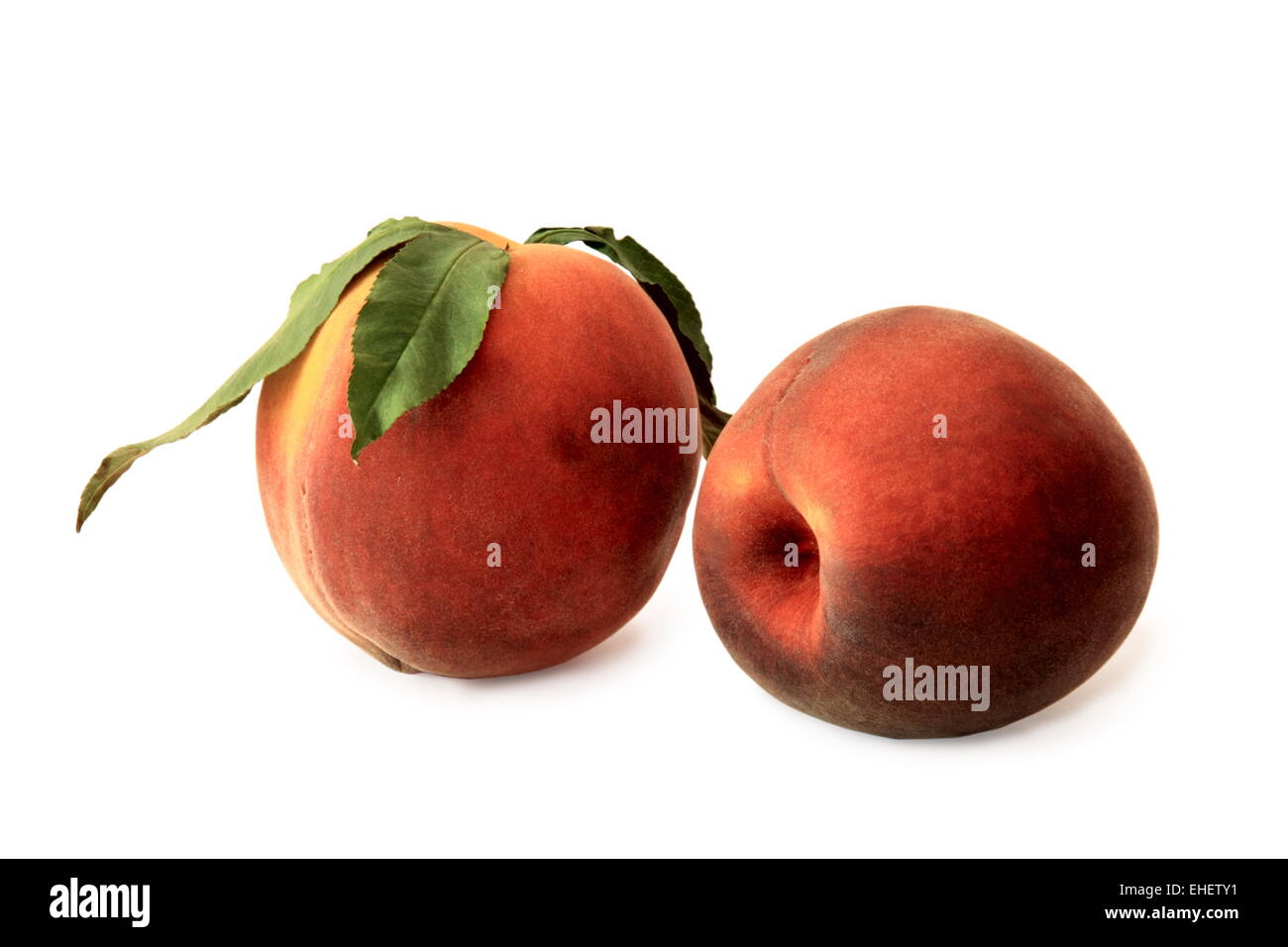Big juicy peaches on a white background Stock Photo - Alamy